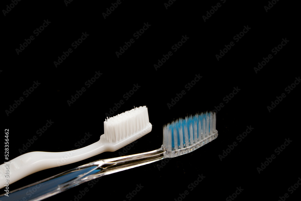 A toothbrush is an oral hygiene tool used to clean the teeth, gums, and ...