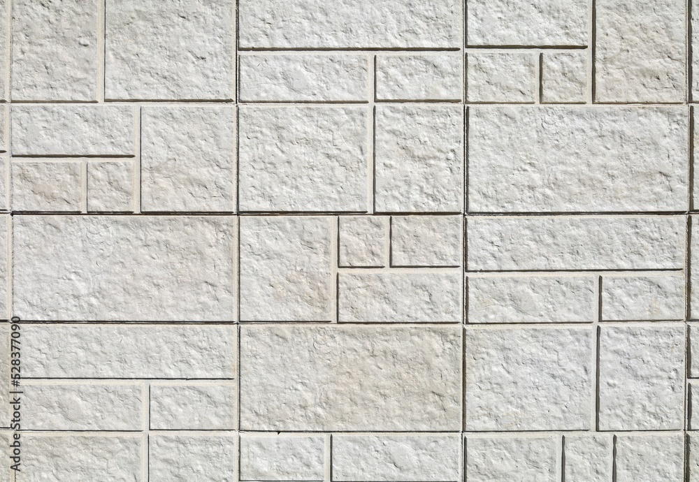 Foto de Exterior stone wall cladding made by white rock panels in tile ...