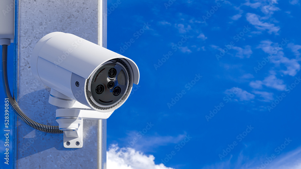 CCTV camera fixed on metal pole with bright sky background. Scan the ...