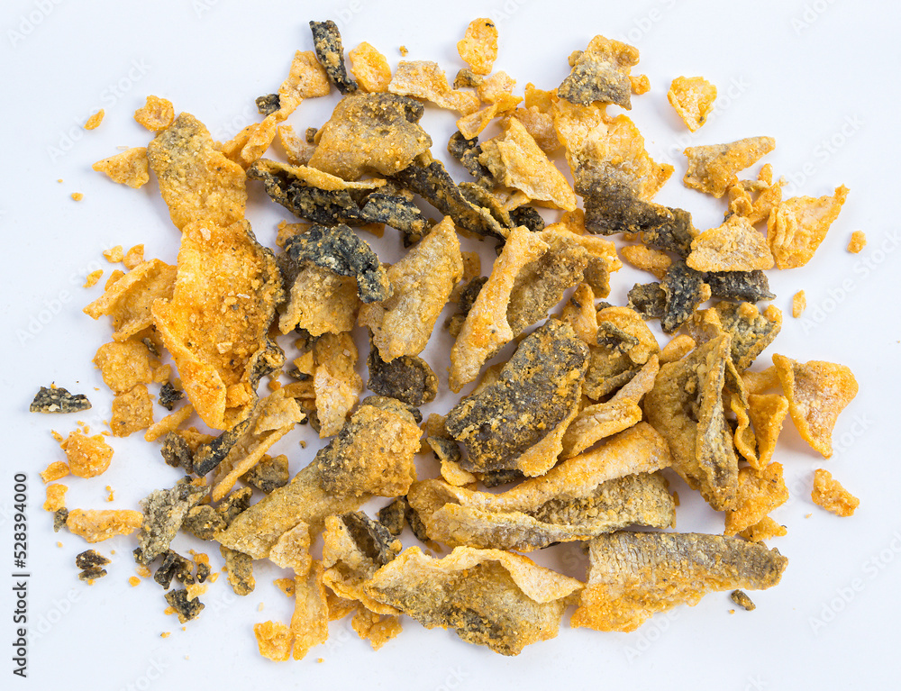 Crispy fish skin on white background.Crispy fish skin snack and used as ...