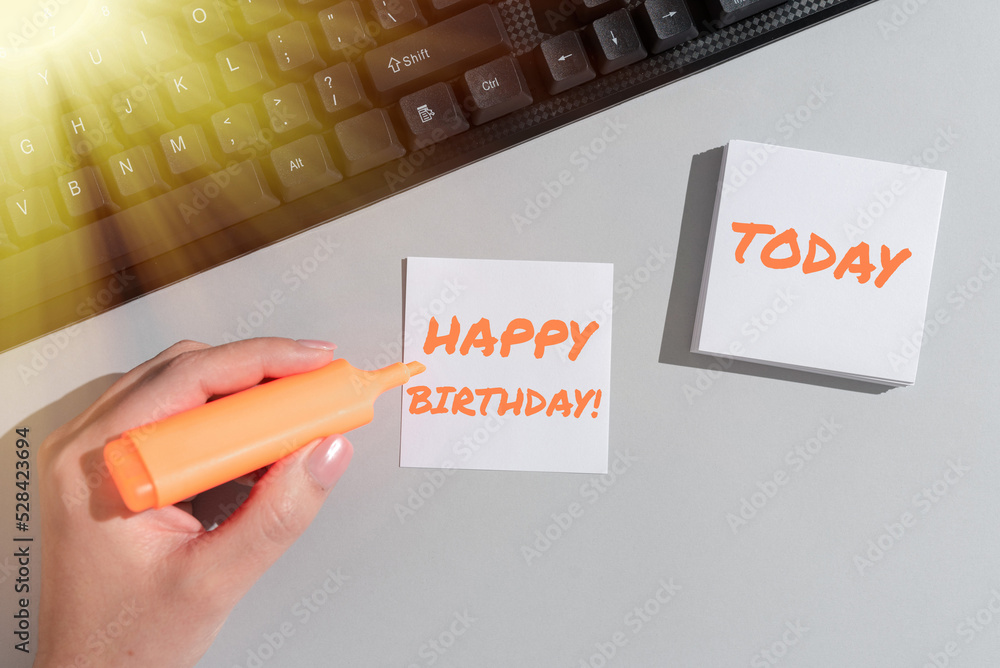 Hand writing sign Happy BirthdayThe birth anniversary of a person is ...