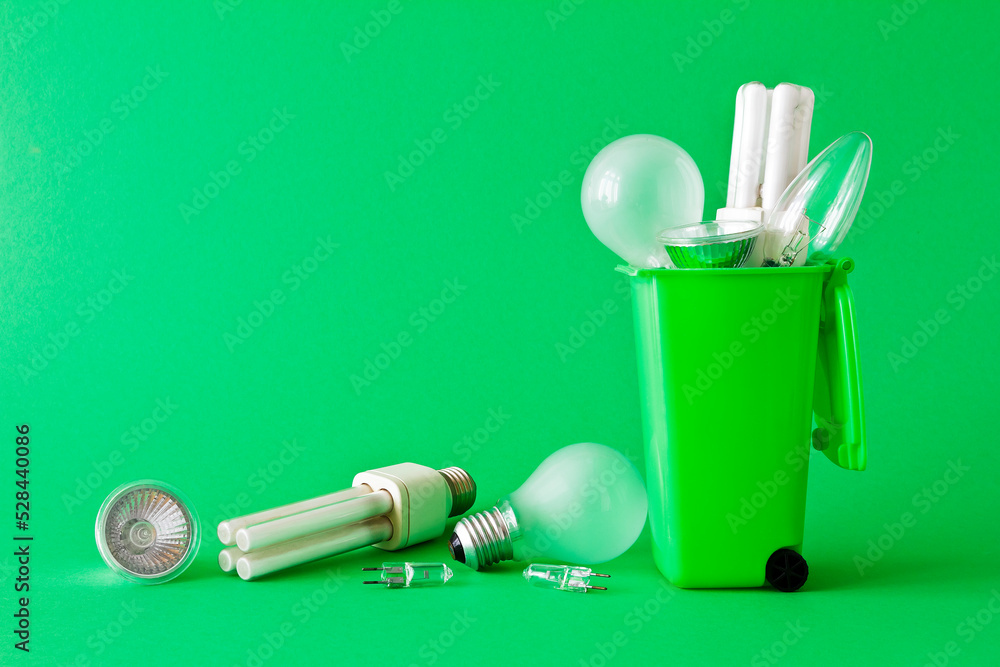Stop energy waste concept: diverse old halogen and fluorescent light ...