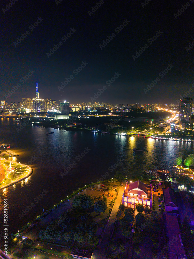 Aerial view of Ho Chi Minh City skyline and skyscrapers on Saigon river ...