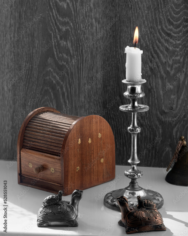Stylish sketch with an antique candelabra and a candle.Antique bronze ...