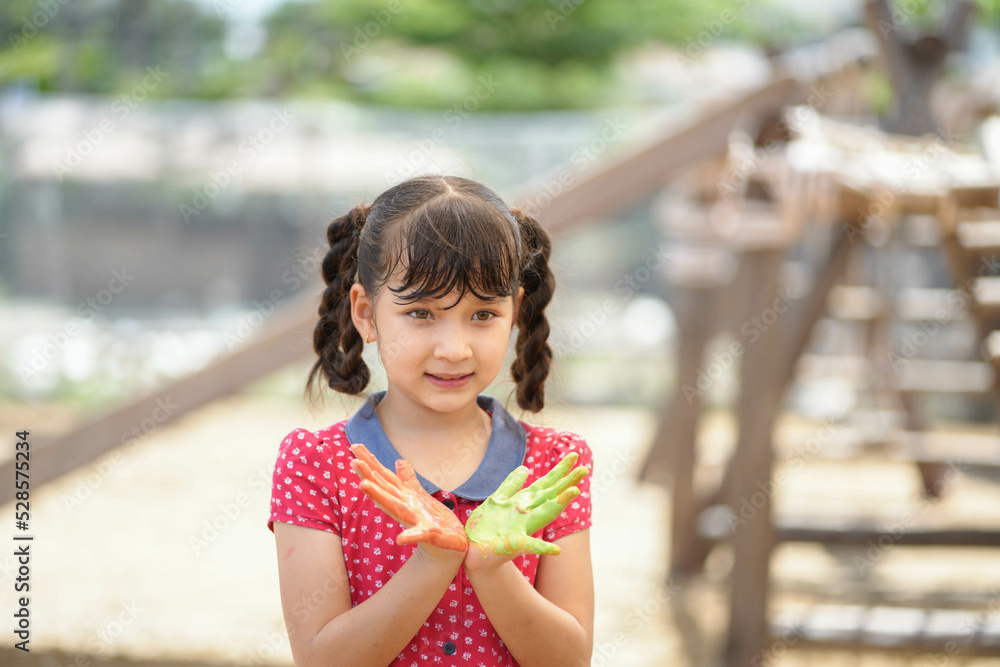Children's drawing workshop, happy children make handprints with paint ...