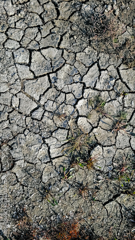 Conceptual ecological background. Dry ground. Dry river bed with choppy ...