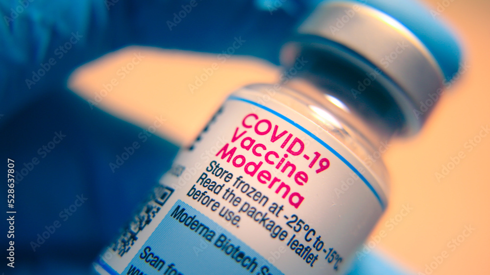 Thailand – SEPTEMBER 5. 2022: Closeup of biontech pfizer and moderna spikevax mrna covid-19 ...