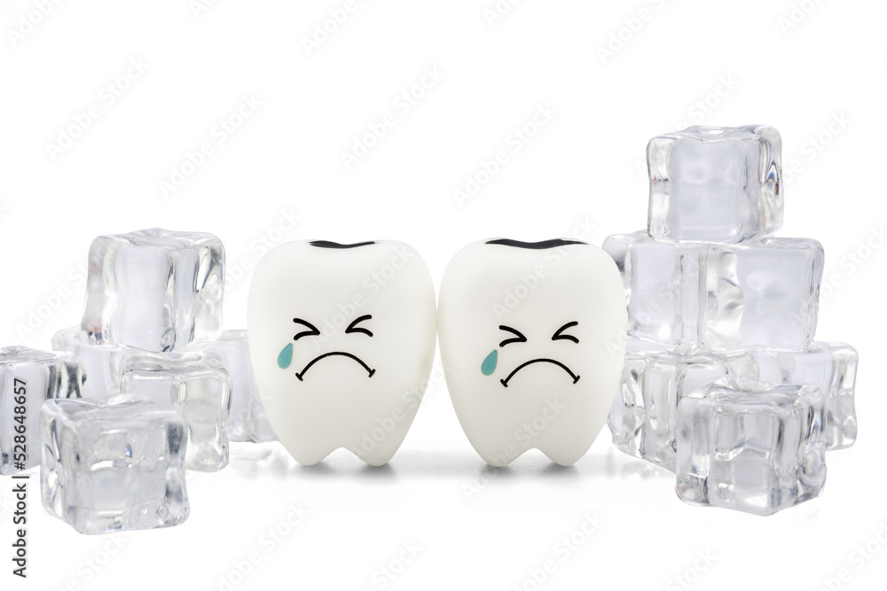Tooth decay sensitive is crying with cold ice on white background ...