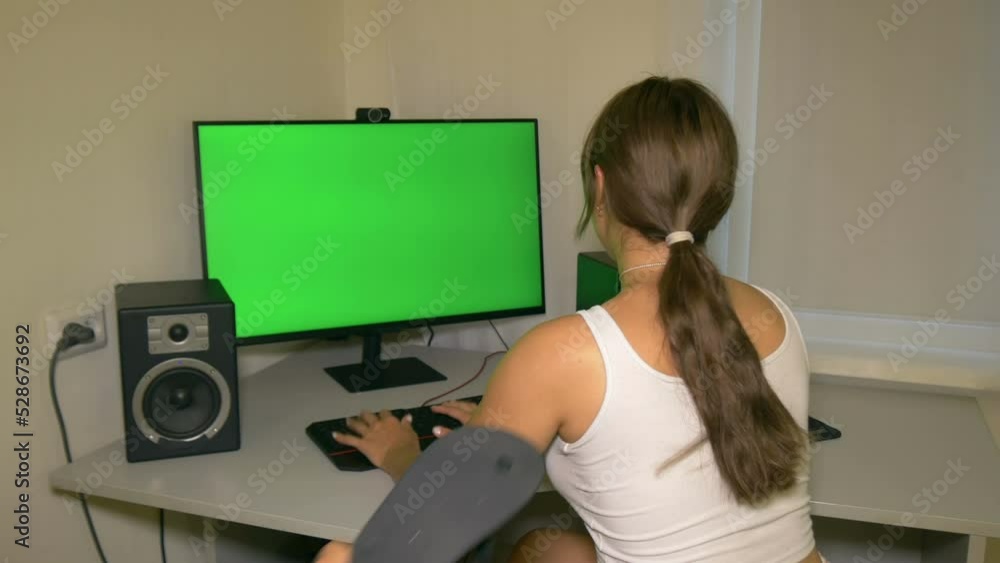 Girl is typing text on the keyboard then guy hits her with slipper ...