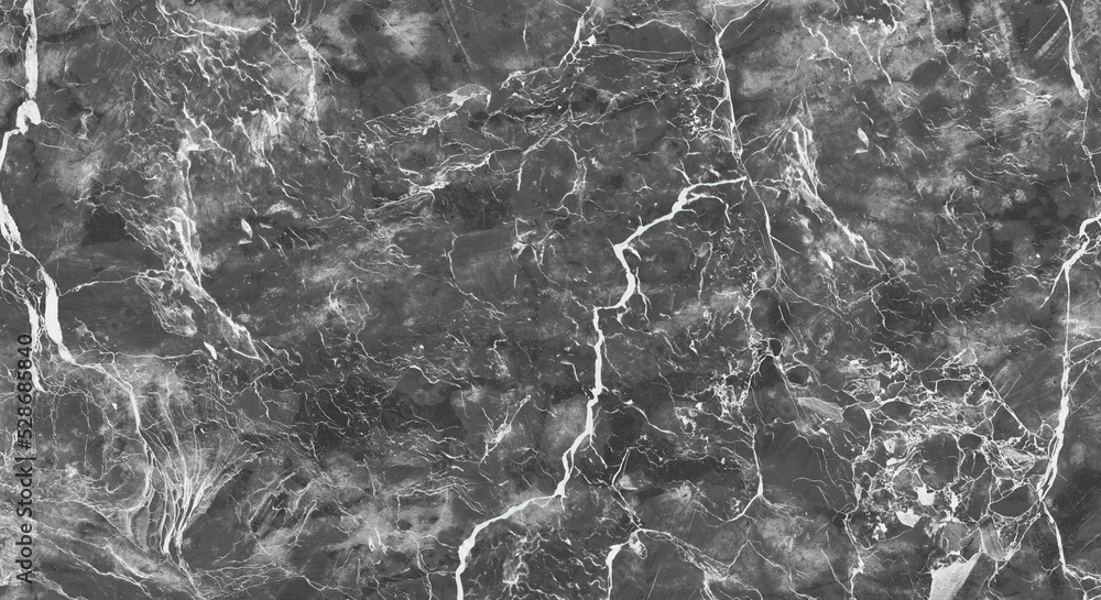 Grey marble texture shot through with subtle white veining (Natural pattern for backdrop or ...