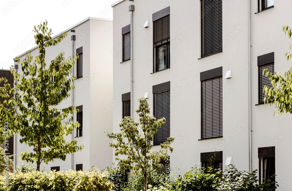 Shutters on Windows of Modern Facade Residential House. External Roller ...