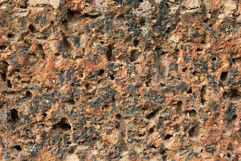 Laterite brick wall background and texture. Natural Laterite rock for ...