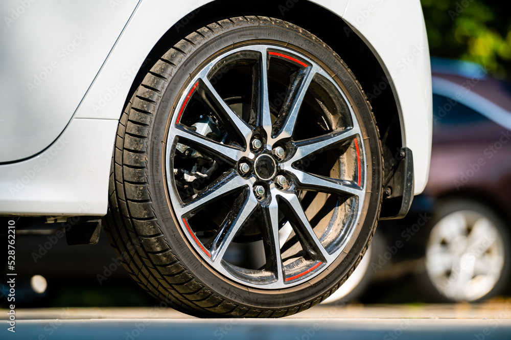 sports car wheels, low profile tires on aluminum rims, closeup Stock ...