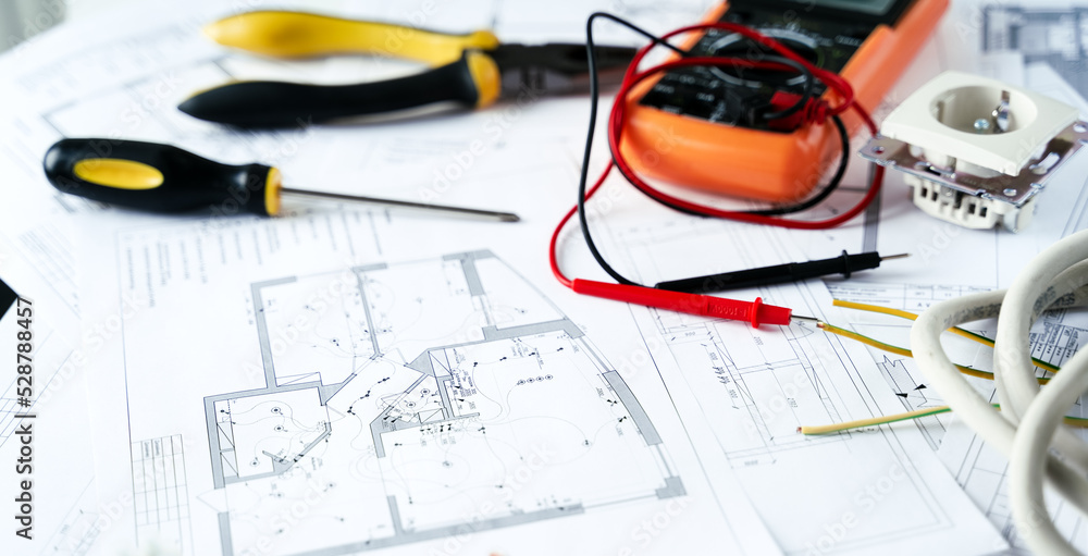 Making repairs,planning electricity project in house.Drawings,diagrams ...