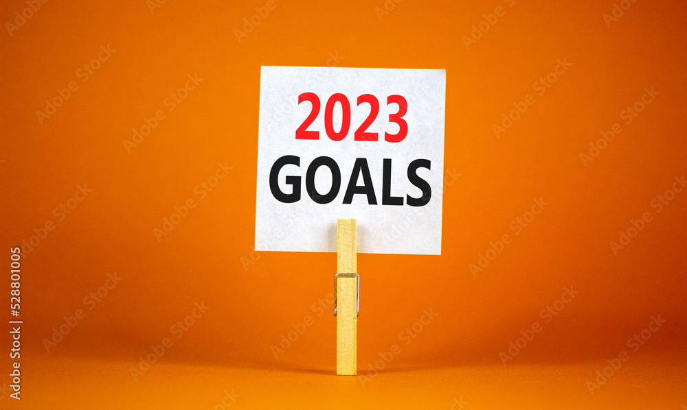 2023 Goals symbol. White paper with words 2023 Goals, clip on wooden ... 2023 Goals symbol. White paper with words 2023 Goals, clip on wooden ...