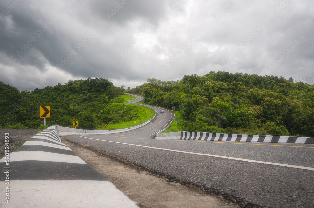road to nowhere, blurred image of an asphalt road that looks like ...