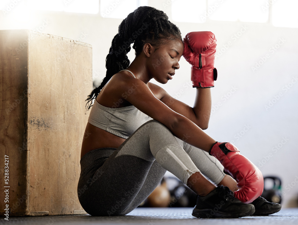 Sport, fitness and woman boxer on break from exercise and training on ...