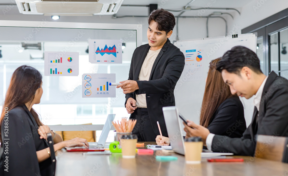 Foto de Asian handsome professional successful businessman presenter ...
