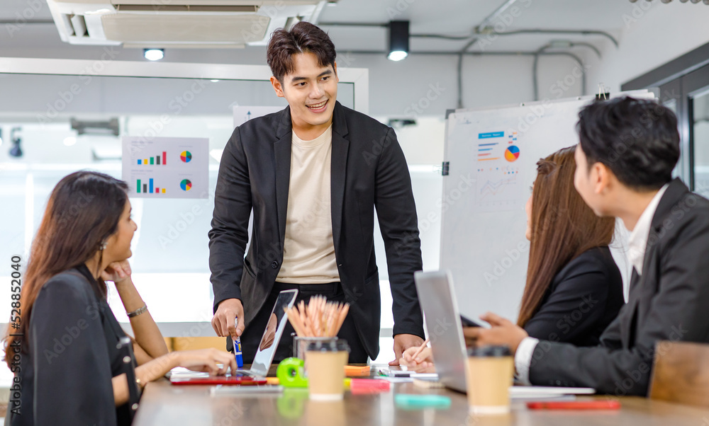 Asian handsome professional successful businessman presenter standing ...