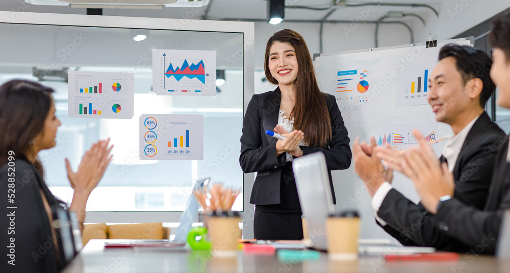 Asian young beautiful professional successful businesswoman presenter ...