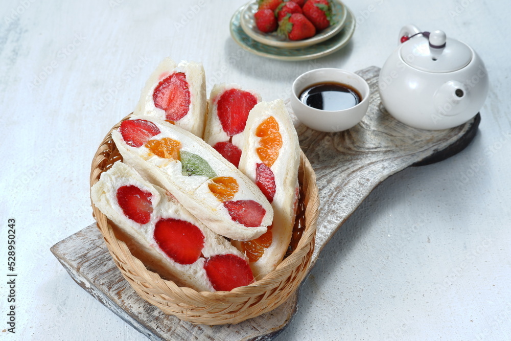 Japanese style sweet fruits sandwich (fruit sando ) with lots of fruits ...