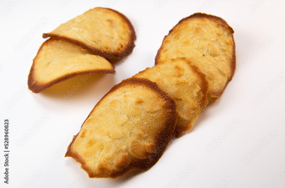 French delicacy pastry tuile with almond on wight background, High ...
