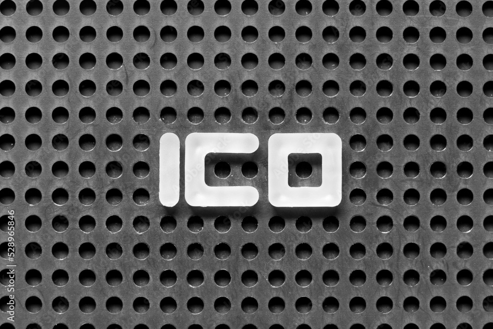 White alphabet letter in word ICO (Abbreviation of Initial coin ...