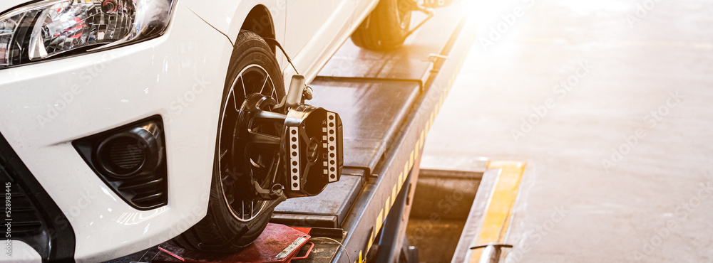 Car on stand with sensors on wheels for wheels alignment camber, Car ...