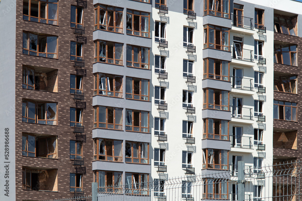 Broken windows of residential civilian building after Russian rocket ...