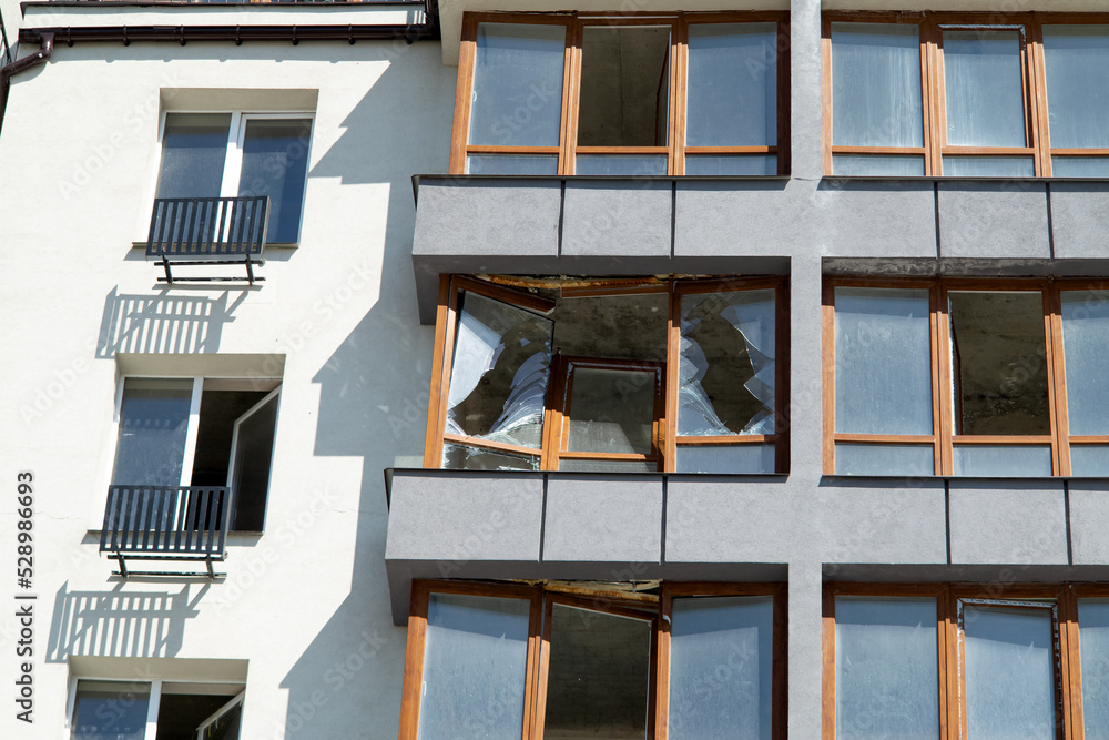 Broken windows of residential civilian building after Russian rocket ...