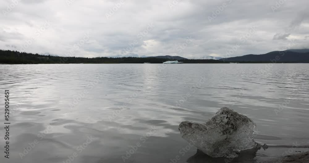 Iceberg glacier on shore Mendenhall Glacier Juneau Alaska fast. Climate ...