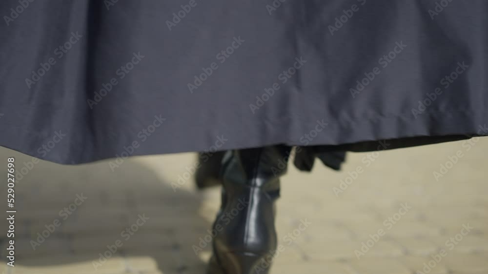 Video Stock Back view female feet in high-heels walking on pavement on ...