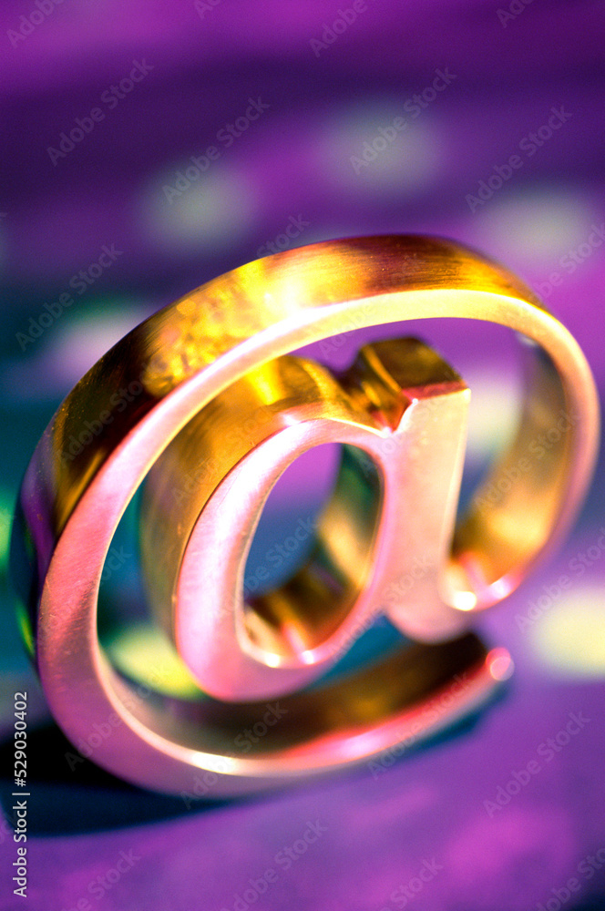 Golden @ symbol Stock Photo | Adobe Stock