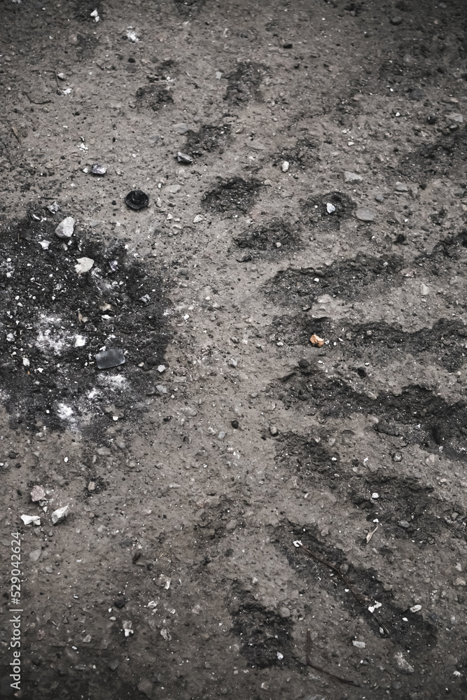Footprint on the pavement after being hit by an artillery shell in ...