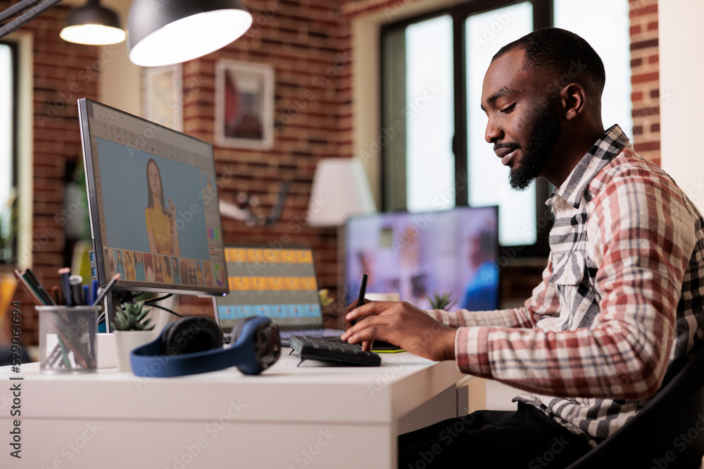 Media photographer using retouching software to edit photo, creating ...