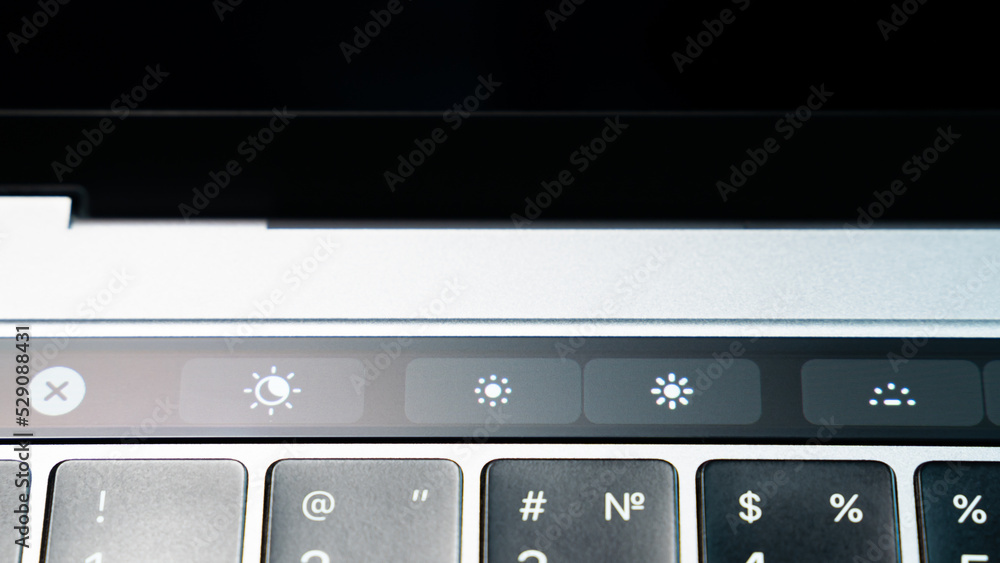 Kiev, Ukraine - August 9,2022: Buttons for adjusting screen brightness ...