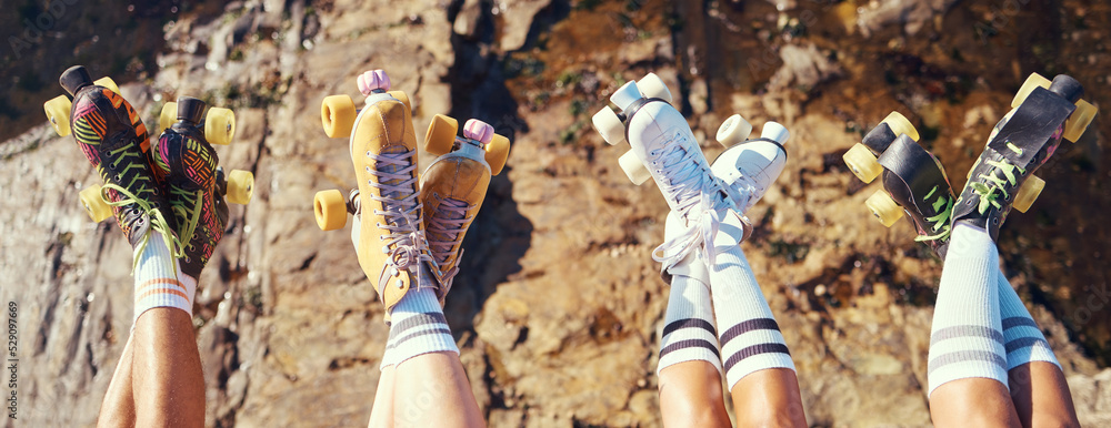 Roller skates, fun and adventure travel with friends group lifting legs ...