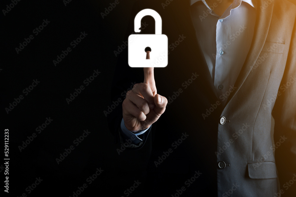 Businessman holds an open padlock icon on his palm.unlocking a virtual ...