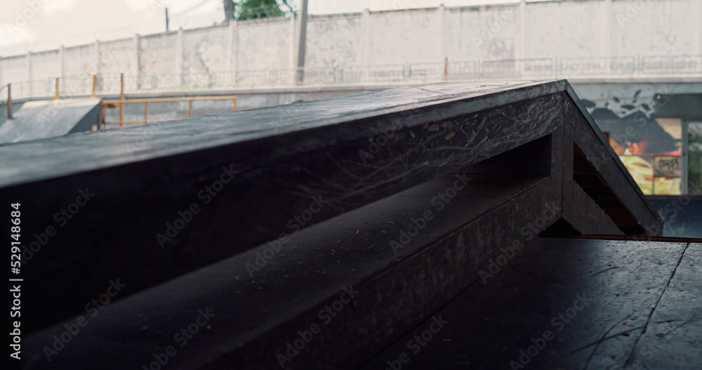 Sports ramp for skate boarding at skatepark. Closeup empty skate board ...