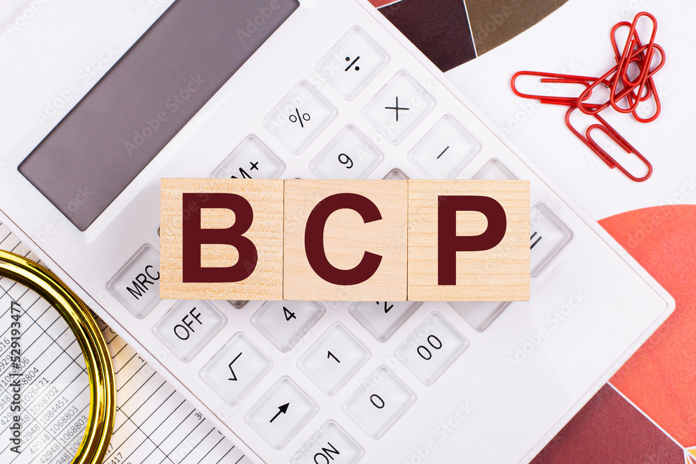 Flat lay, top view of office desk. Workplace with white calculator ...