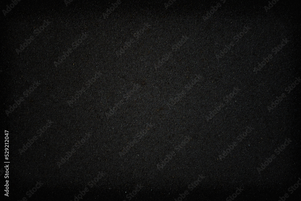 Blank flat surface of gray color. Dark background with fine texture and ...