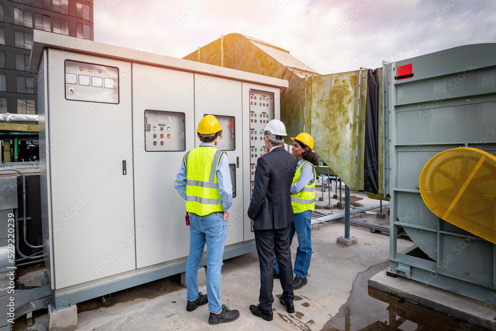 The engineer checking and inspecting at MDB panel .he working with ...