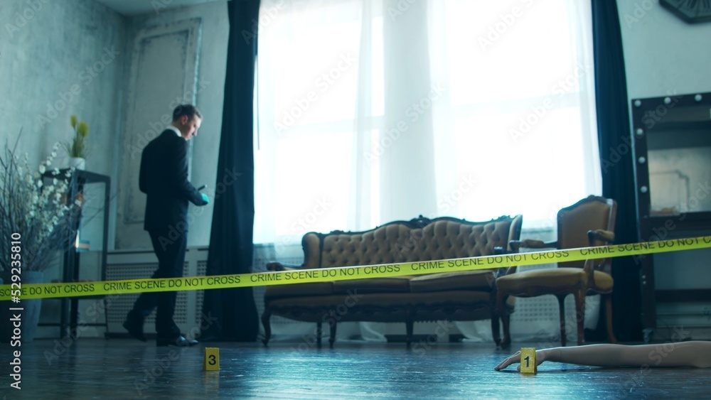 Detective Collecting Evidence in a Crime Scene. Forensic Specialists ...