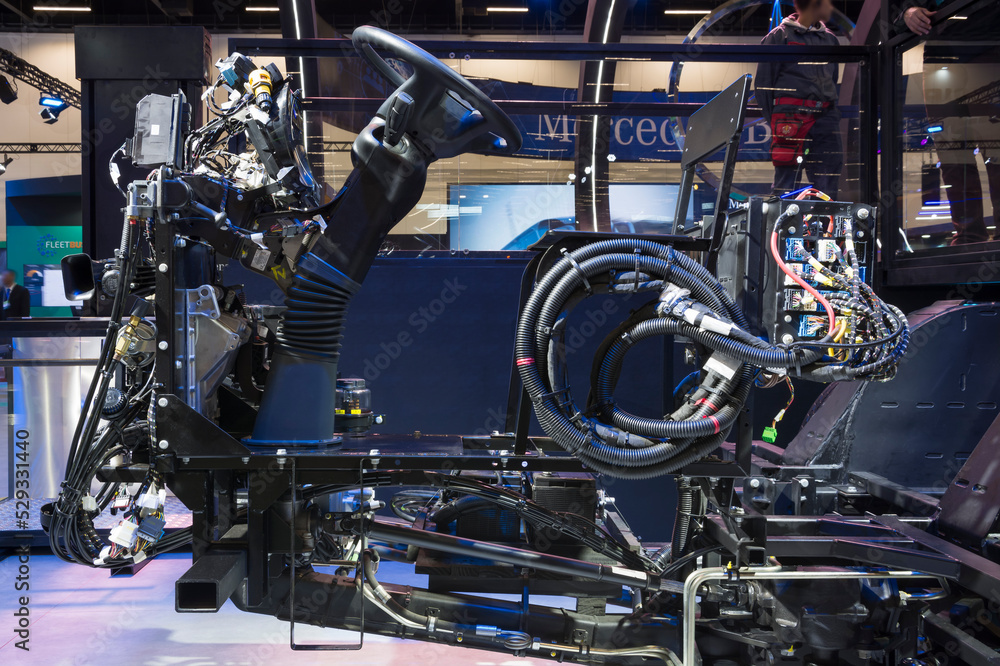 Exposed chassis, engine, gears and motor of a bus on display at the LAT ...