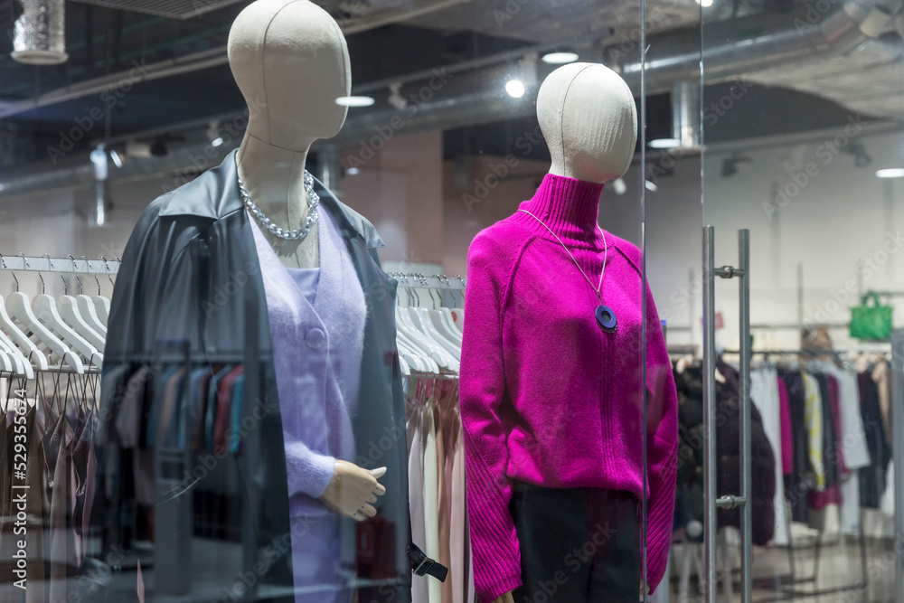 Mannequins in the window of a women's clothing store. Fashion & Style ...