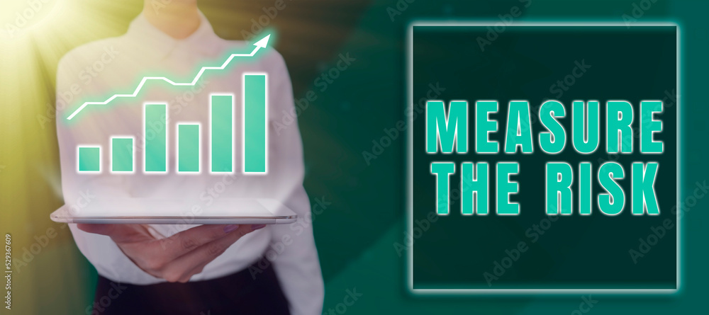 Hand writing sign Measure The Riskdetermine degree of danger based on ...