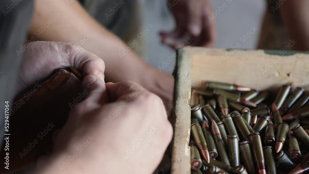 Hand taking ammo, bullets 762 caliber for ak47, gun crime military ... Hand taking ammo, bullets 762 caliber for ak47, gun crime military ...