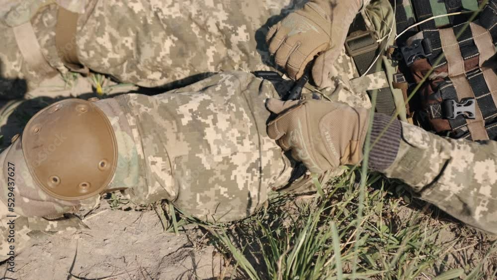 Combat medical tourniquet stops the flow of blood during a first aid ...