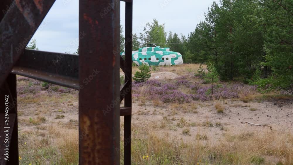 layout of the fuselage of an old helicopter on military range for ...