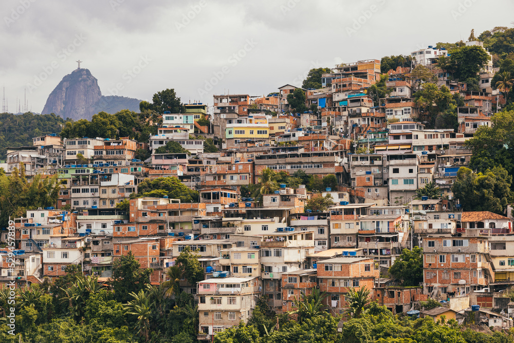 Favela and the Cristo Redentor in Rio de Janeiro Stock-Foto | Adobe Stock